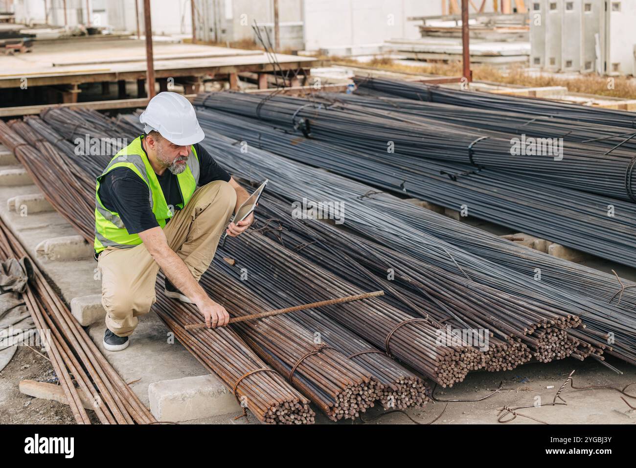 Engineer worker, Officer working check steel bar strength grade for high quality products and ...