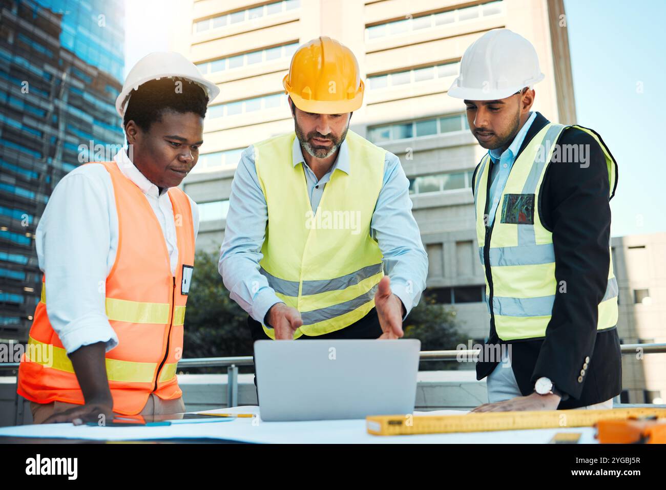 Construction manager on rooftop talking hi-res stock photography and ...