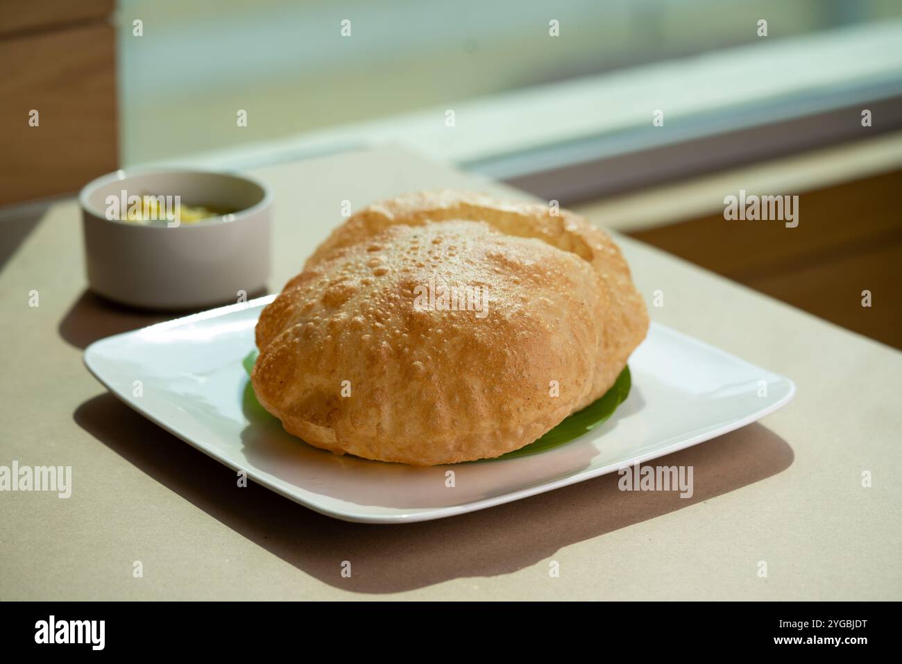 Close up picture of bhatura with curry Stock Photo - Alamy