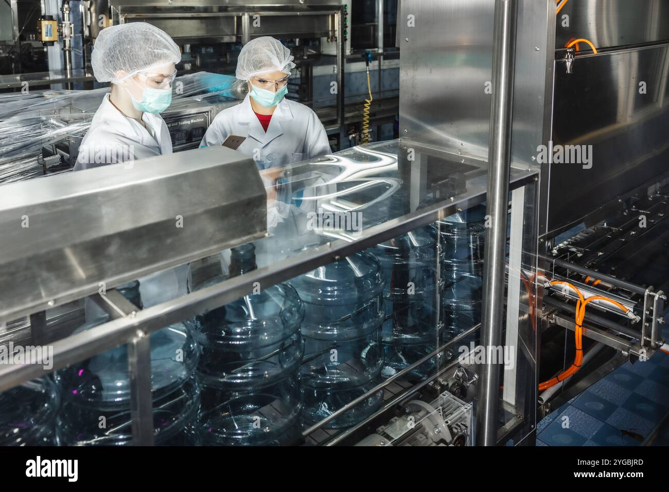 Worker people working in Drinking water factory, Hygiene uniform ...