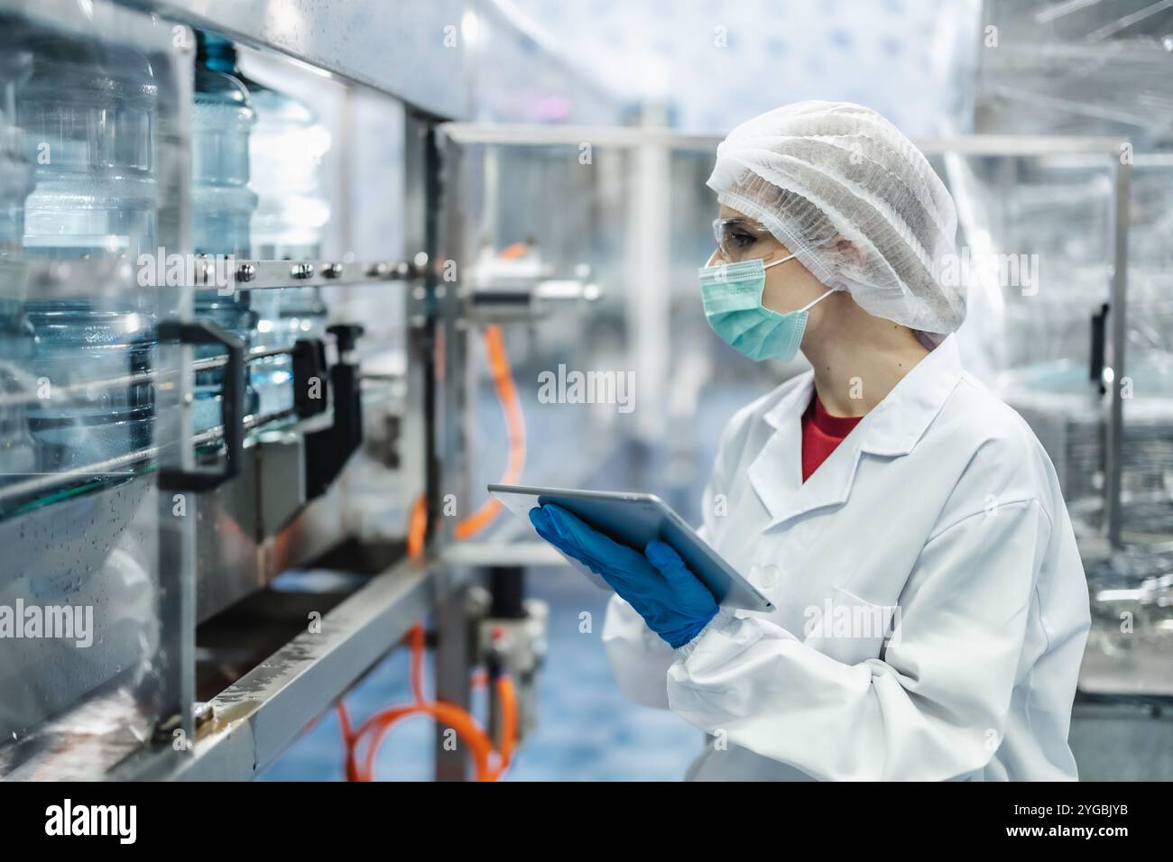 Worker people working in Drinking water factory, Hygiene uniform ...