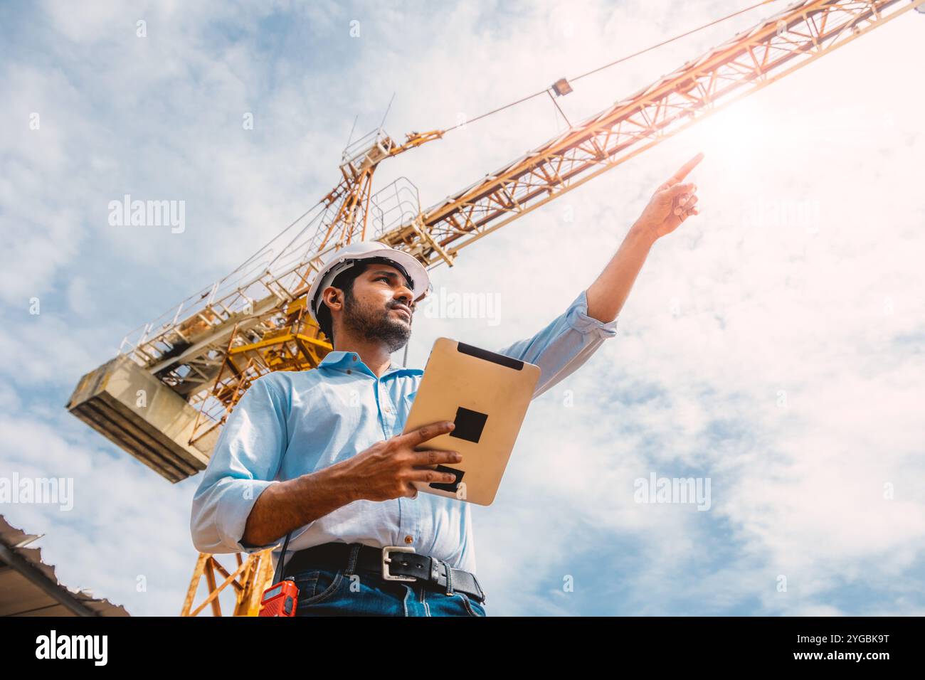 Indian construction engineer worker construction site control operation ...