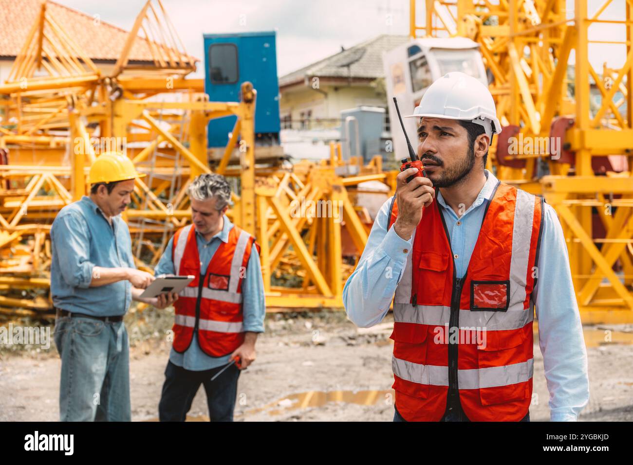 Indian worker engineer construction site control radio operation ...