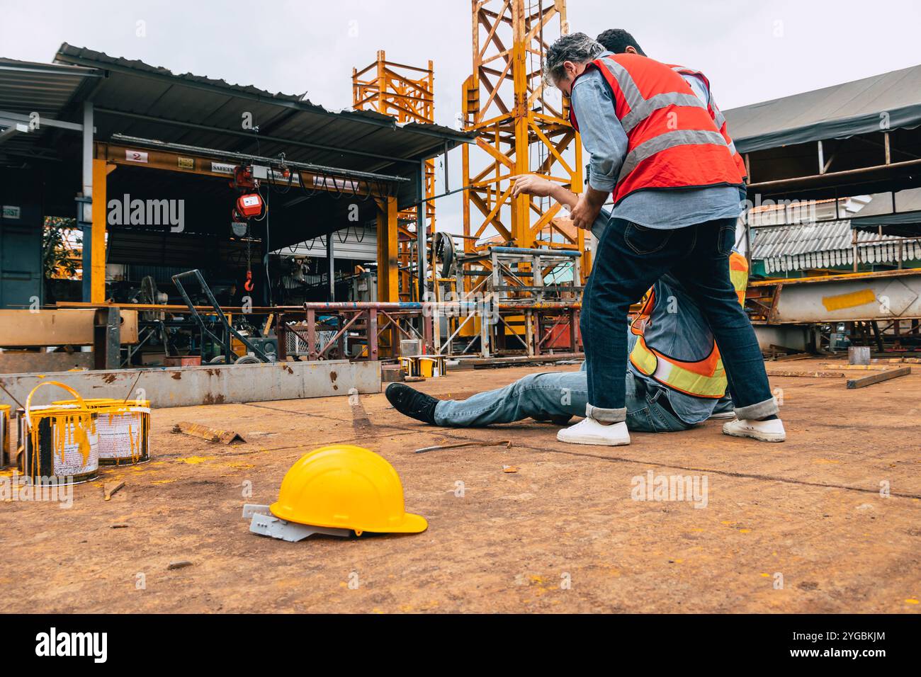 Accident worker injury, man down at construction site, construction ...