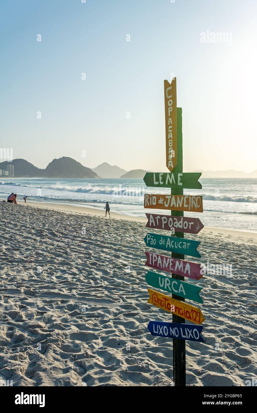 Signpost at Copacabana Beach in Rio de Janeiro in Brazil at sunrise ...