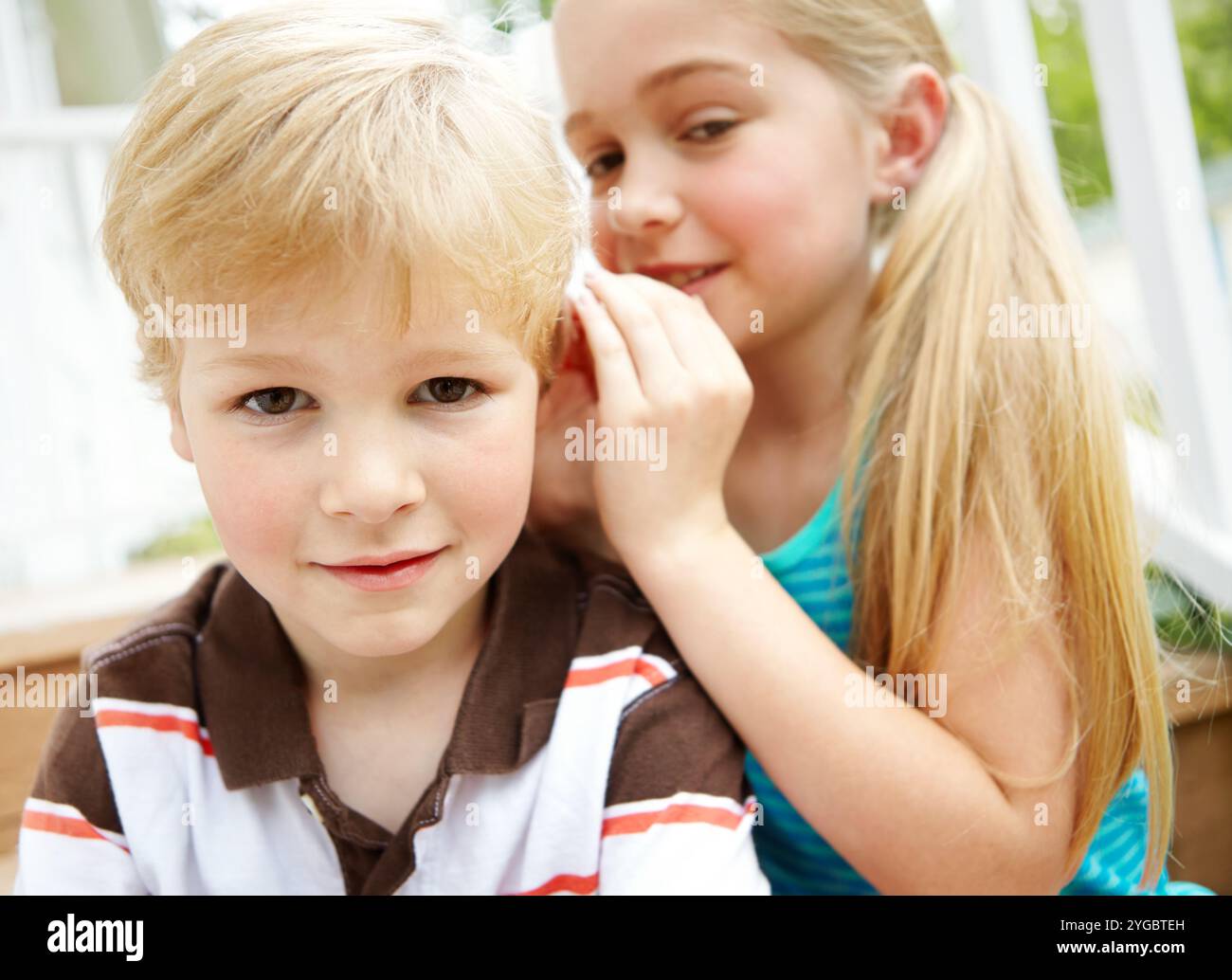 Portrait, whisper and children with secret, outdoor and girl with ...
