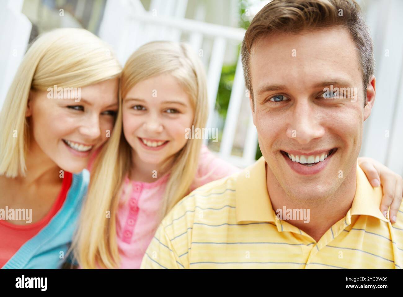 Home, parents and smile with girl outdoor for support, bonding and proud in Canada. People ...