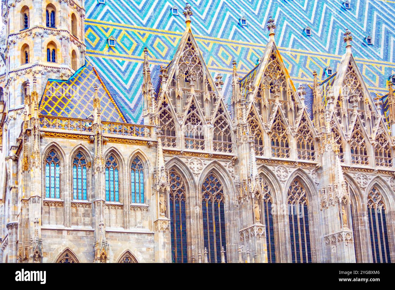 St. Stephans catedral in Vienna with multicolored rooftop. Gothic ...