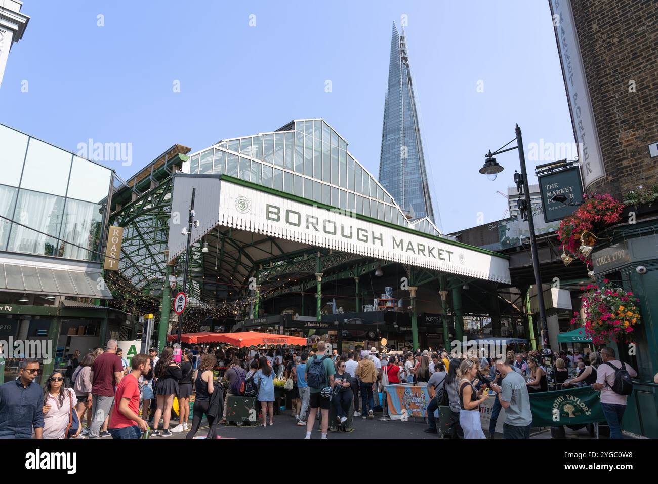 Tourists and visitors thronging the historic Borough Market, a ...