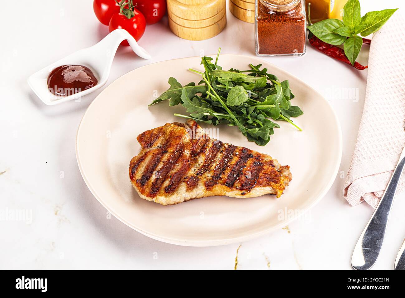 Delicous grilled pork meat steak with sauce Stock Photo - Alamy