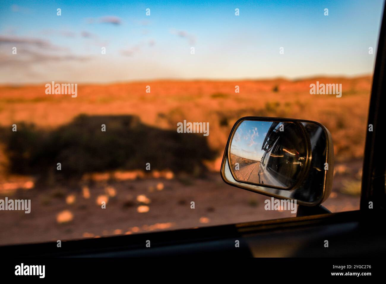 Road trip passenger view looking out the window from a moving vehicle ...