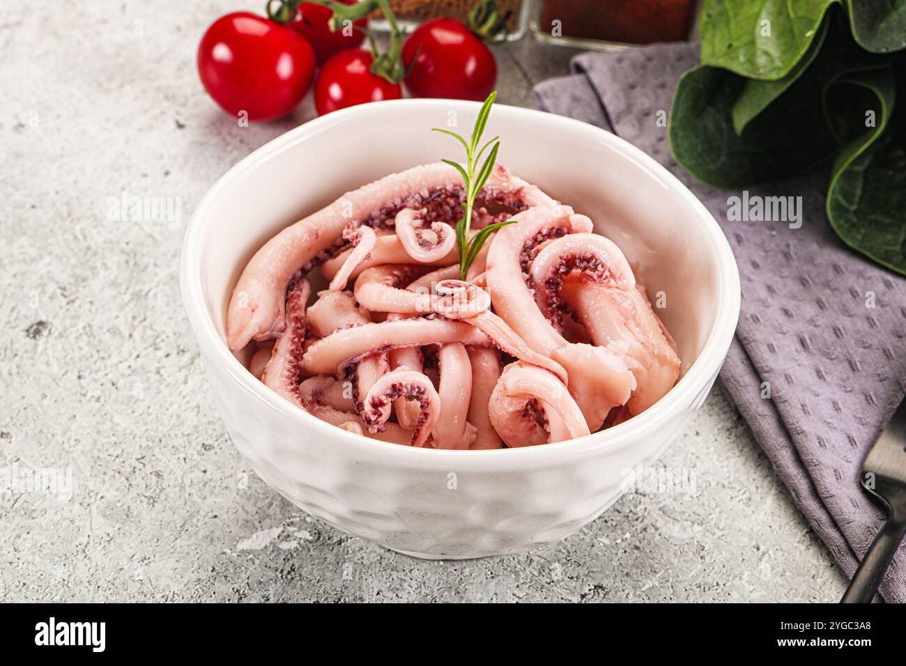 Marinated squid tentacles in the bowl for snack or salad Stock Photo ...