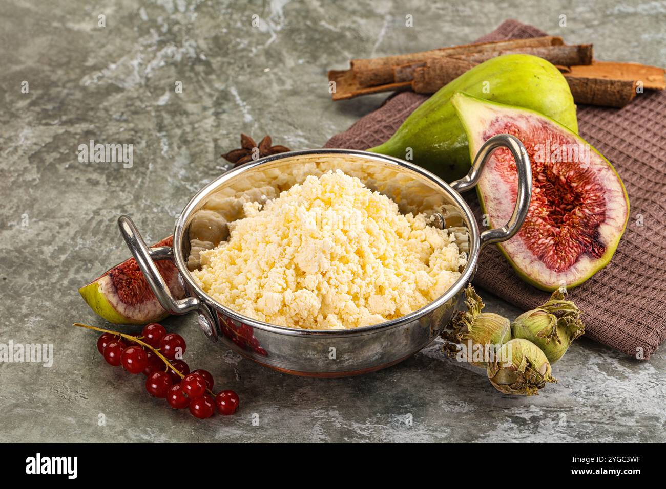 Delicous sheep cottage cheese curd served fig Stock Photo - Alamy