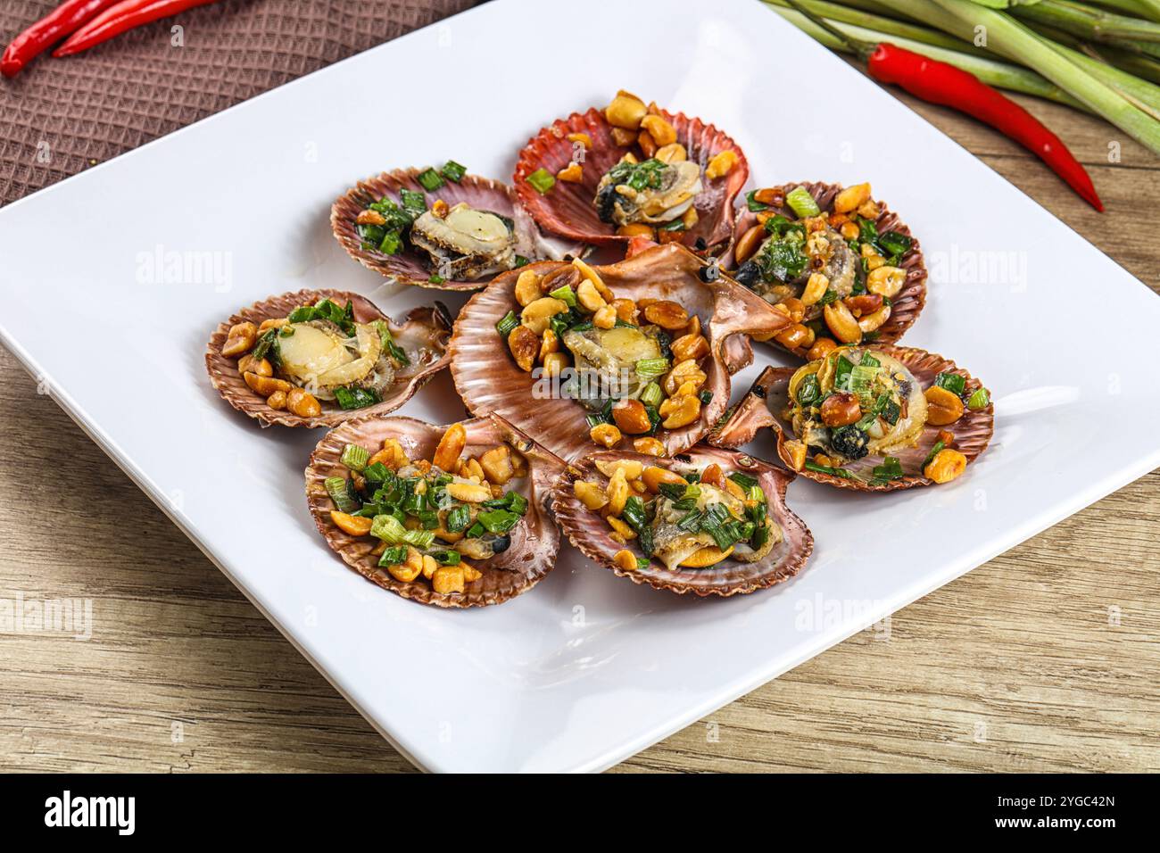 Baked scallops with scalion oil and green onion Stock Photo - Alamy