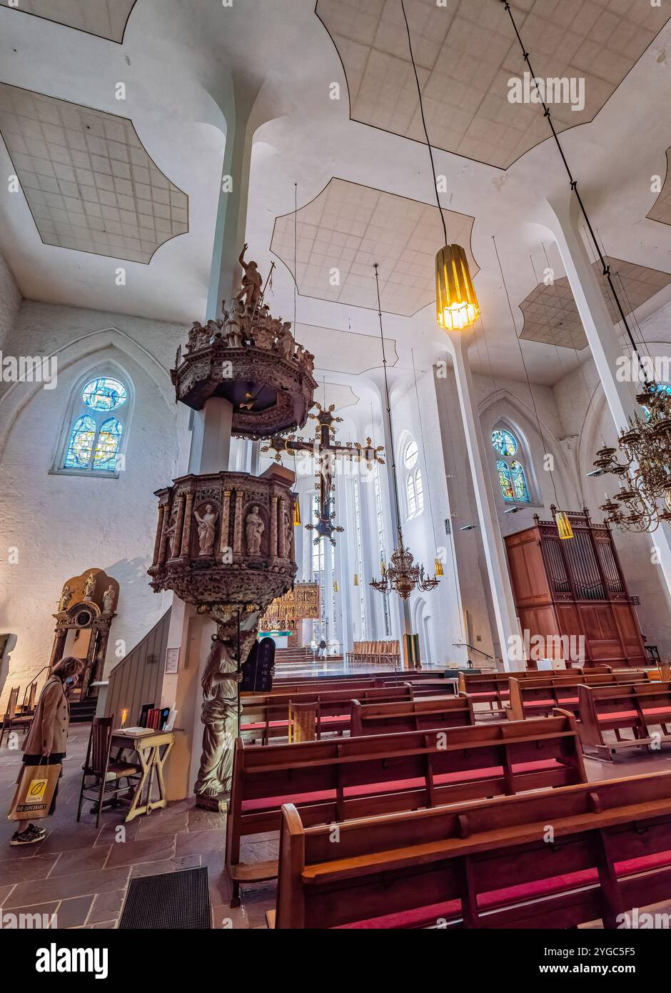 Majestic interior of a historic church, featuring stained glass windows ...