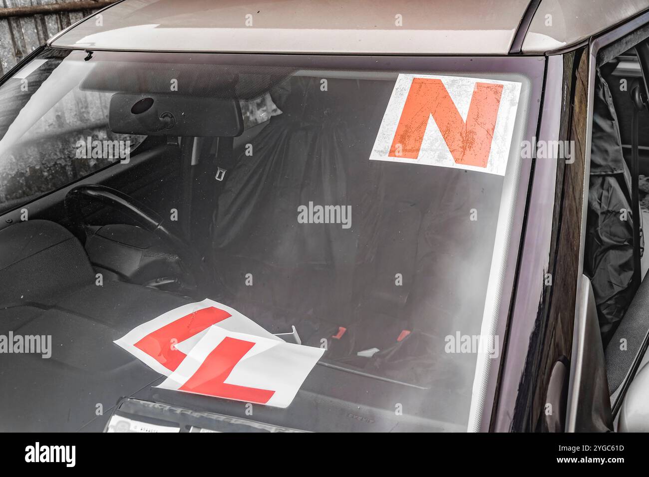 Replacing L plates with N plates (indicating the transition from ...