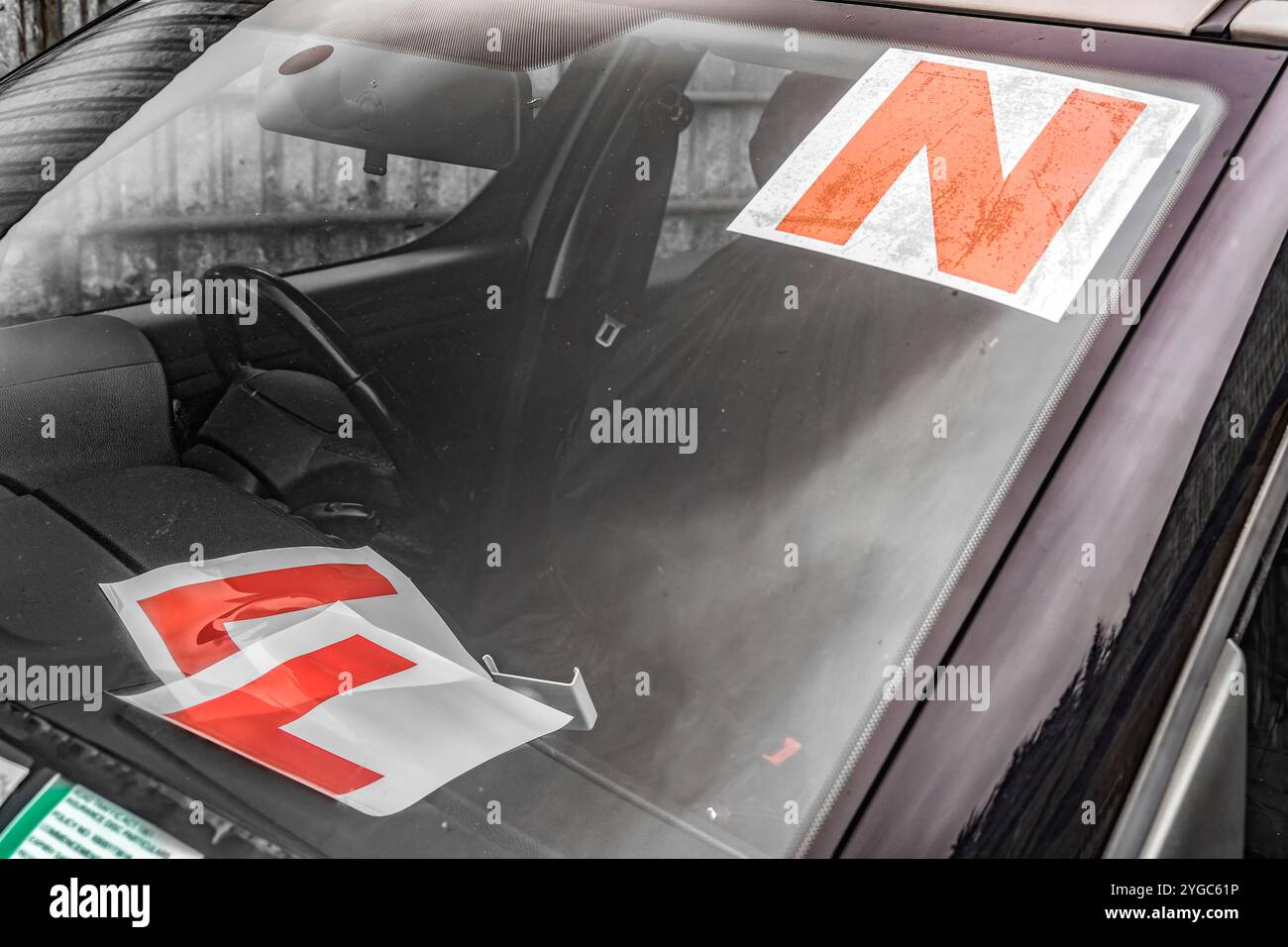 Replacing L plates with N plates (indicating the transition from ...