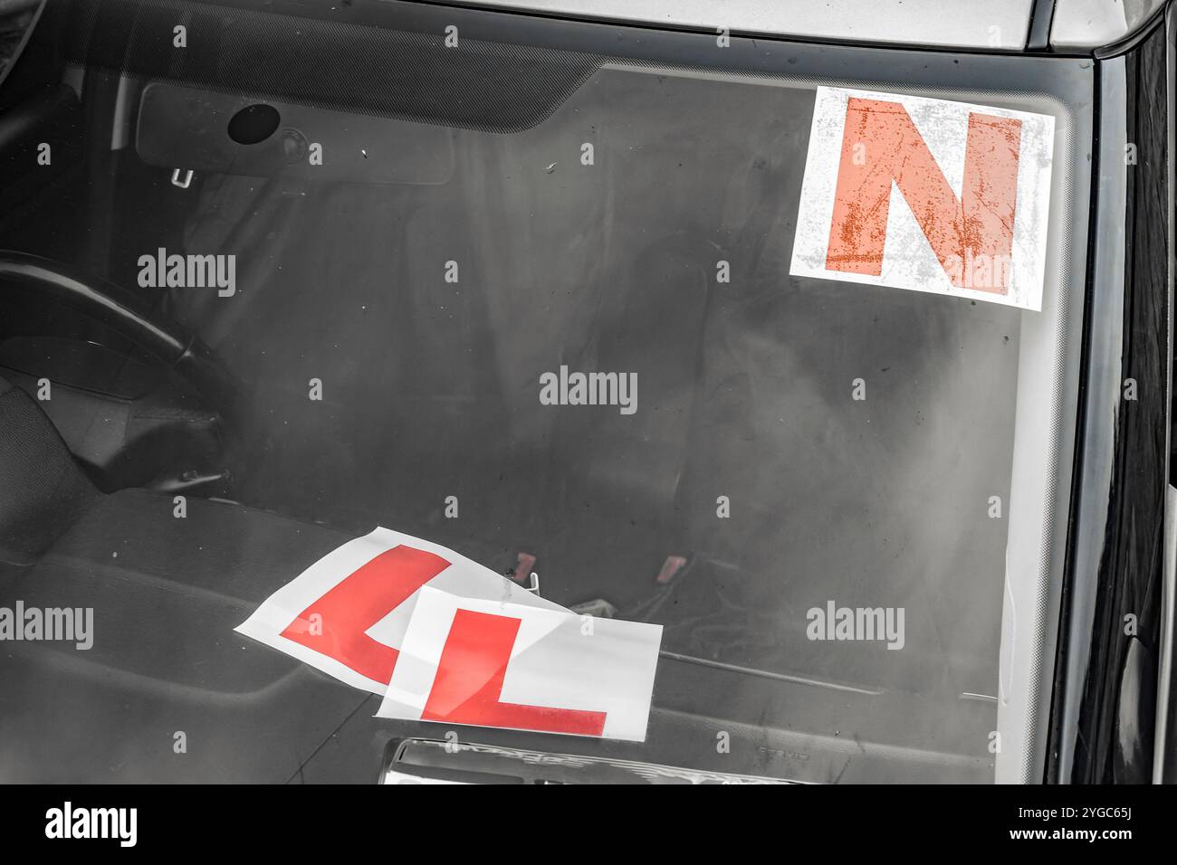 Replacing L plates with N plates (indicating the transition from ...