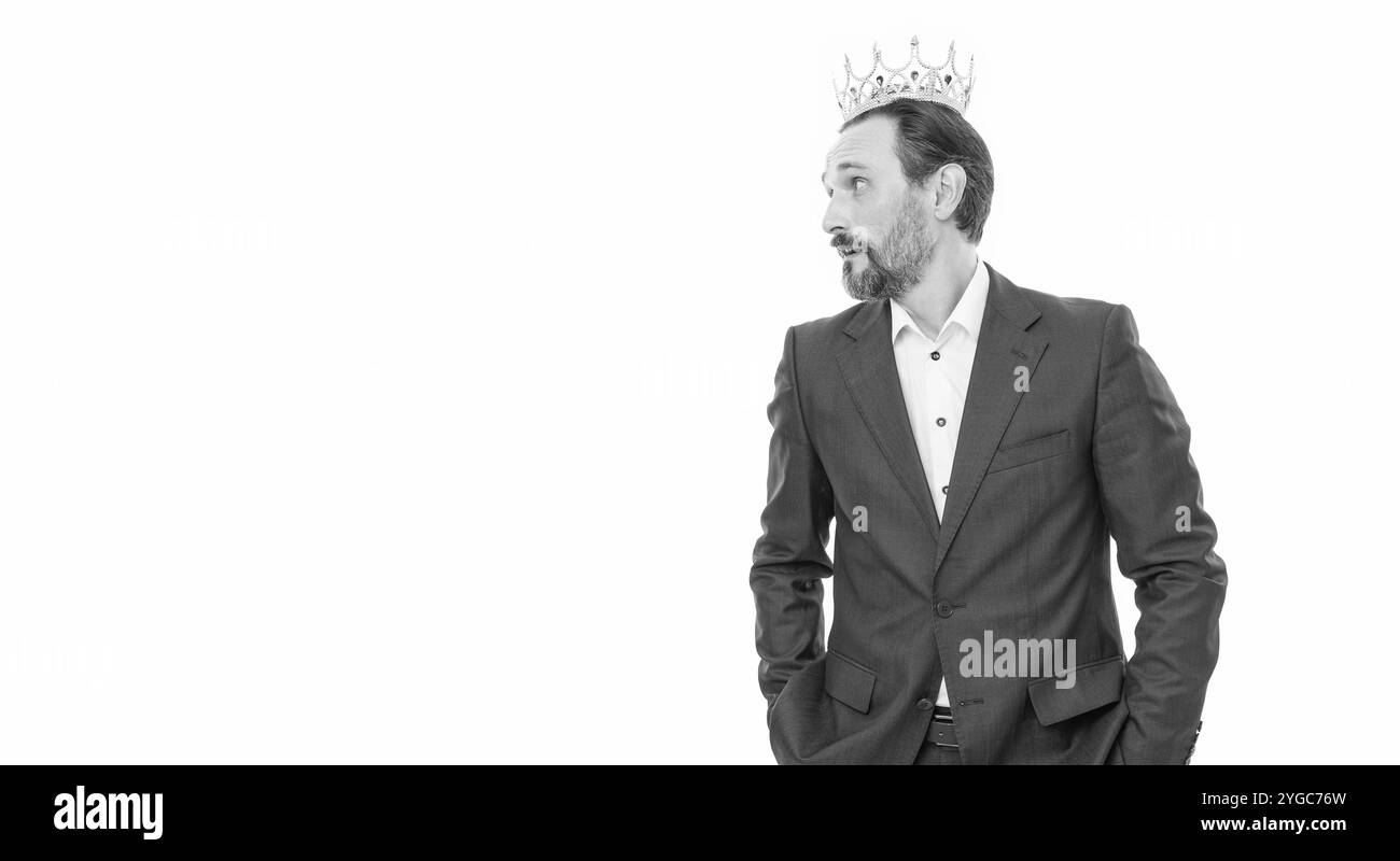 photo of surprised businessman winner in crown and suit. businessman ...