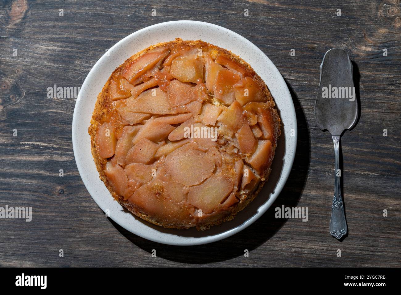 Traditional sliced fruit pie with pears and honey in plate , close up ...