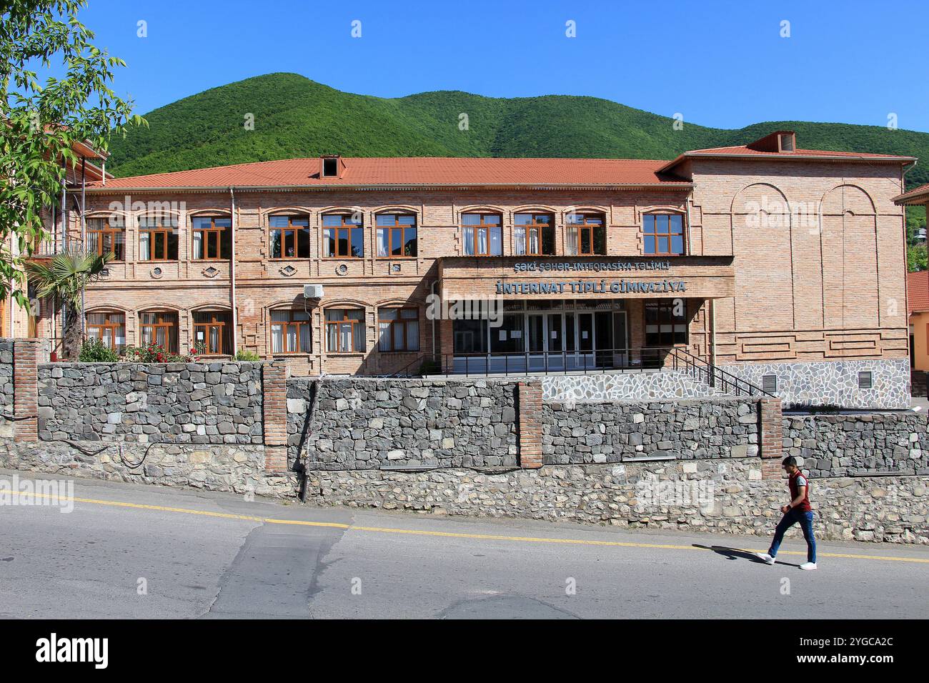 A view from Sheki city center. Schools and government buildings in ...