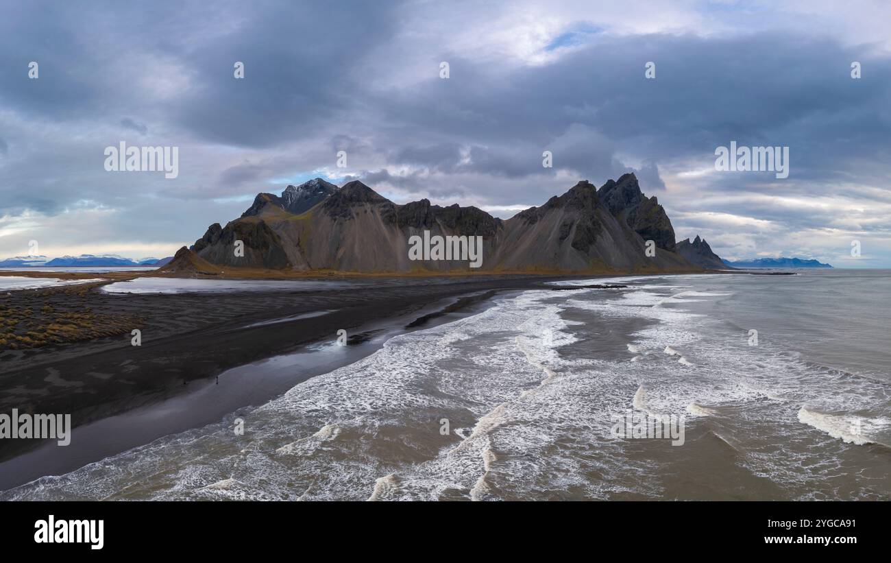 Aerial view of the black sand dunes in front of Vestrahorn mountain ...