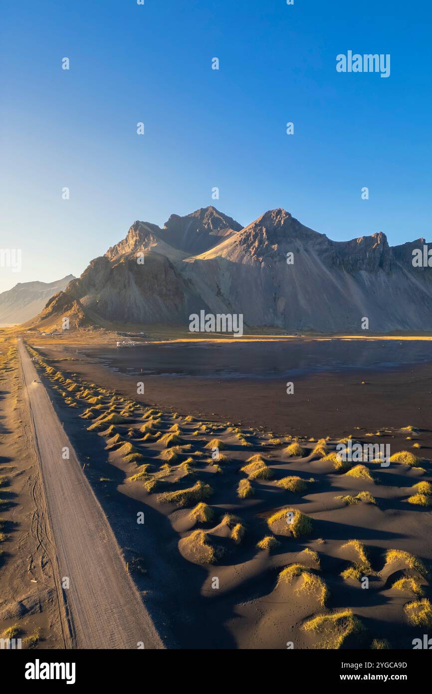 Aerial view of the black sand dunes in front of Vestrahorn mountain ...