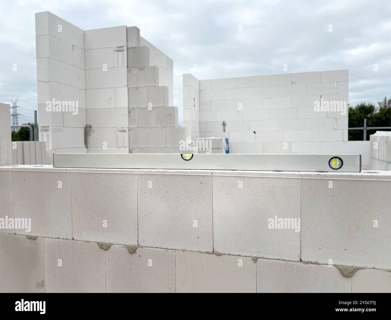 White cement block walls at a construction site. German house building ...