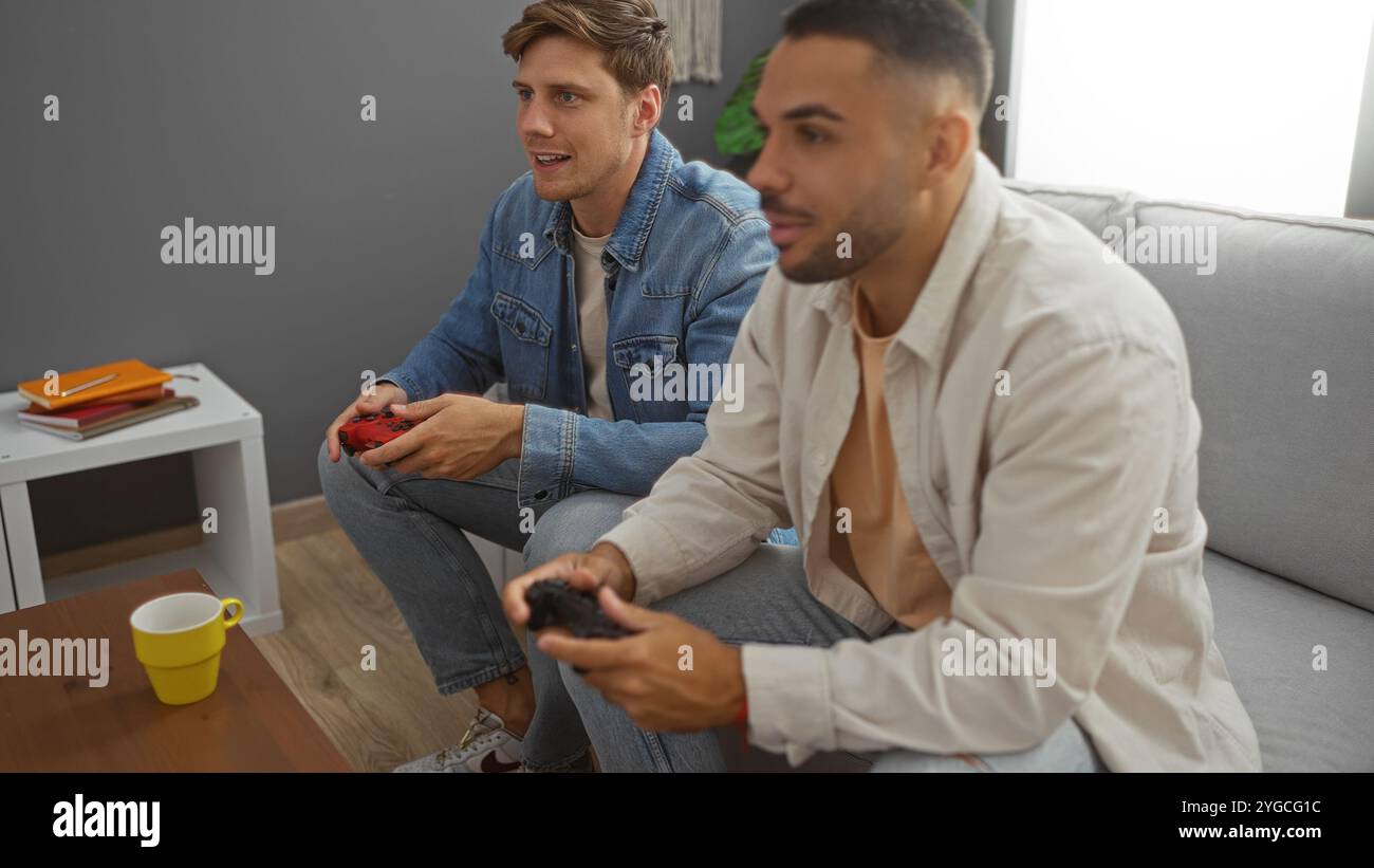 Men friends playing video games together in a modern living room Stock ...