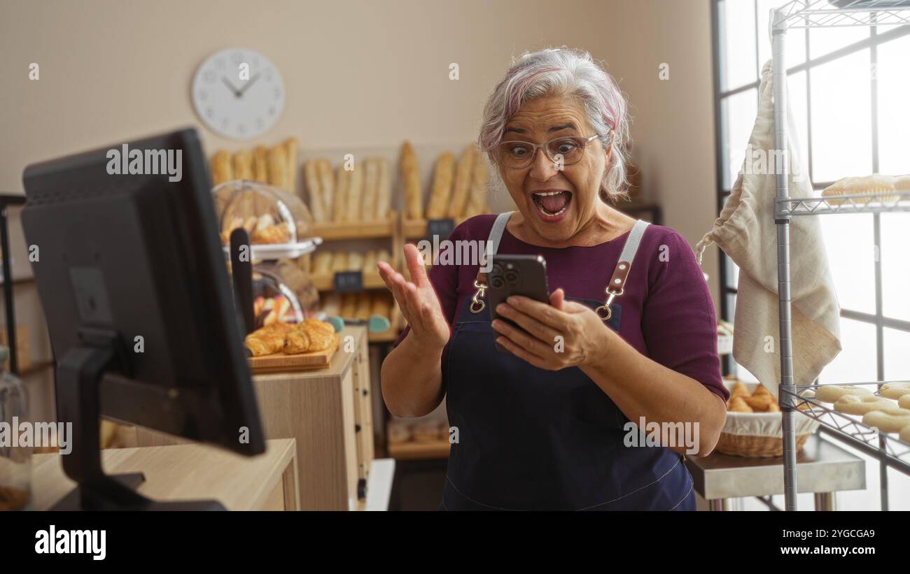 Elderly woman with grey hair inside a bakery shop looking surprised at ...