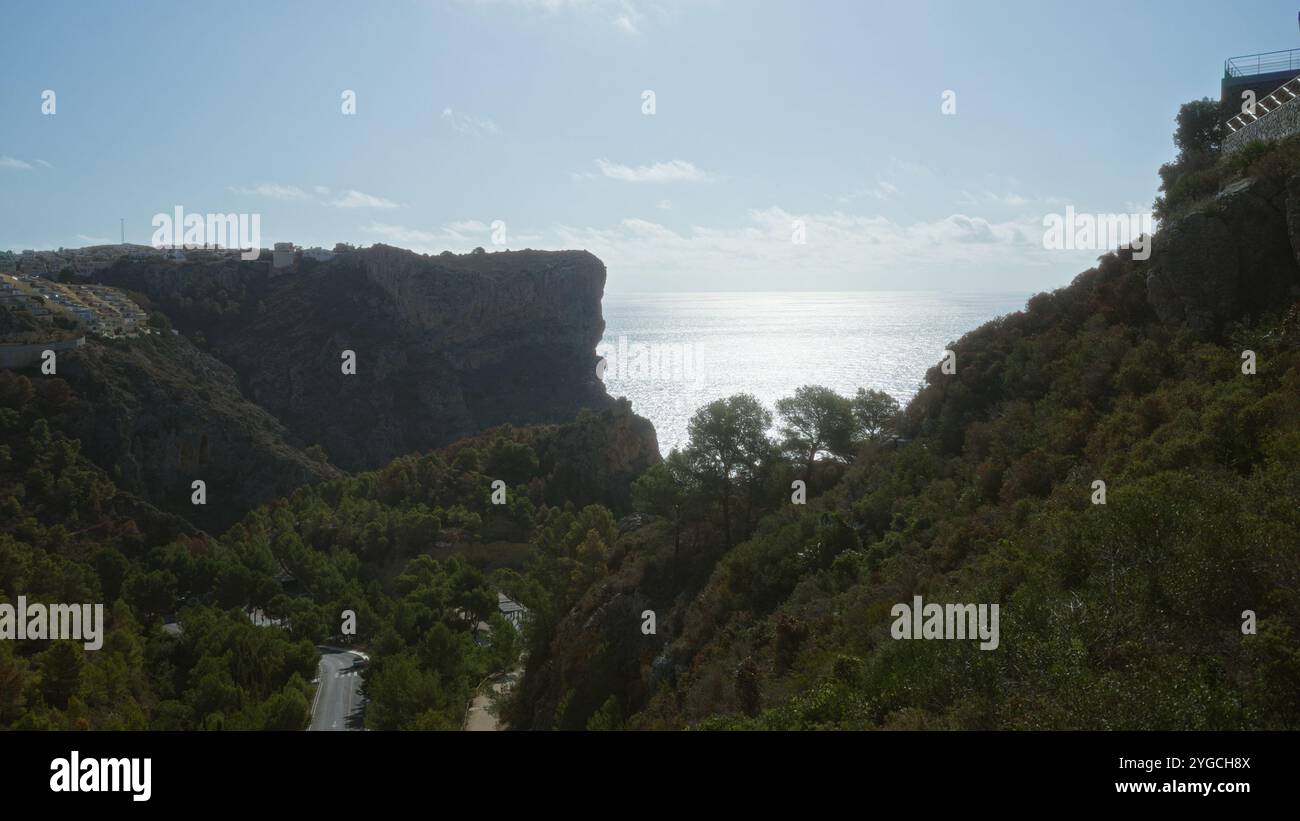 A scenic coastal landscape featuring cliffs overlooking the ...