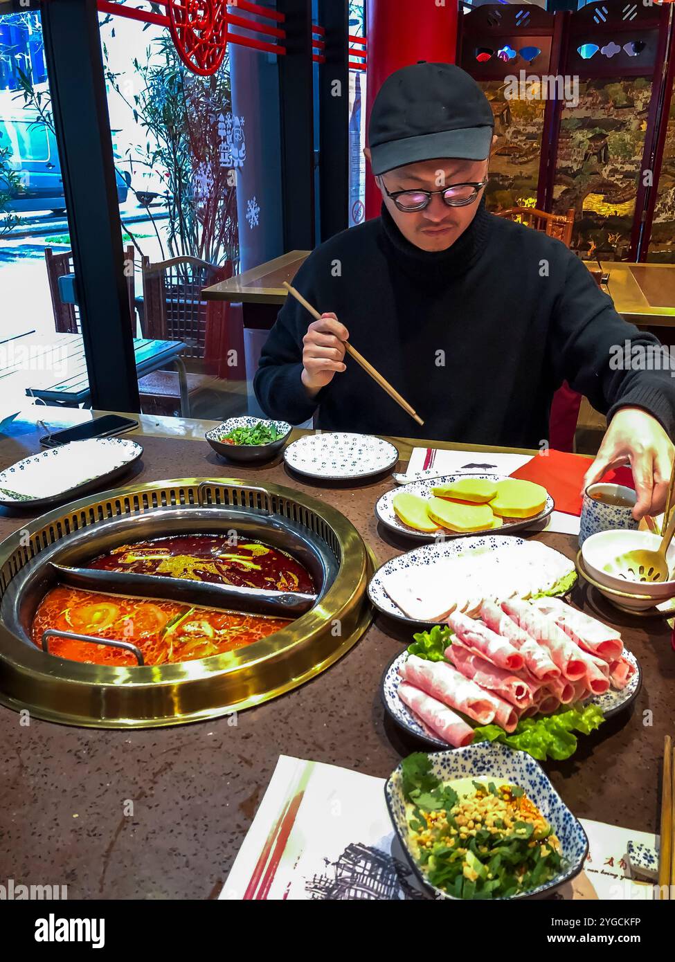 Paris, France, Chinese Tourist, Eating Alone at Table, inside Chinese ...