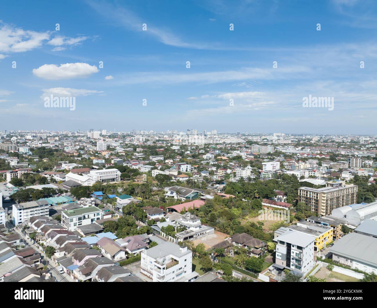 panoramic Afternoon sunlight image of suburbs stretching big city which ...