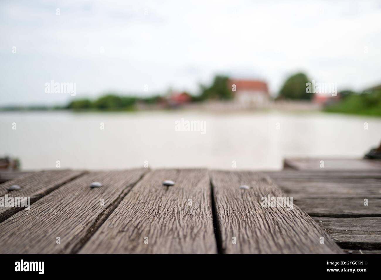 close up vintage old wood plate at pier with river background Stock ...