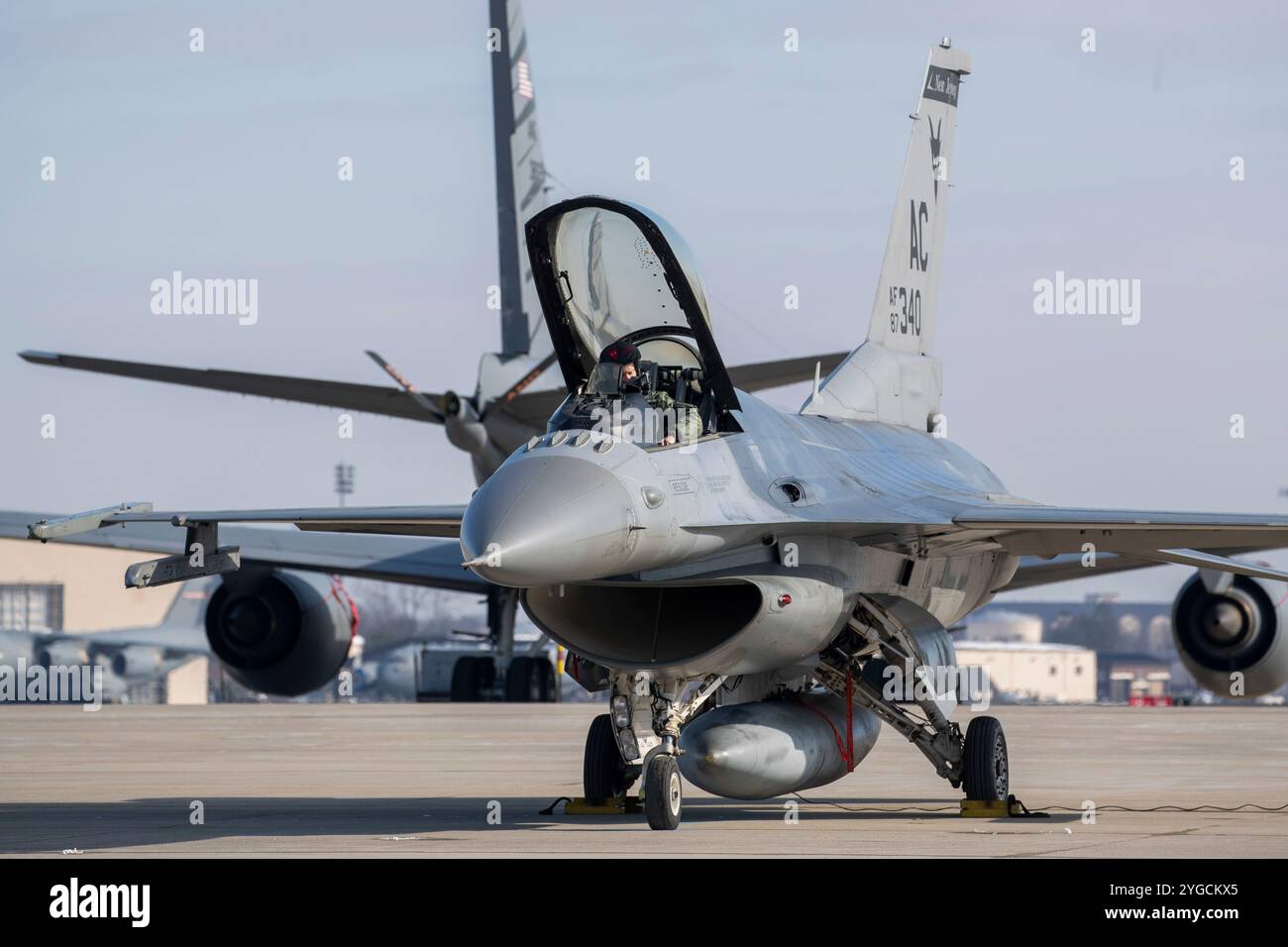 U.S. Air Force Maj. Eric Emerson prepares his F-16C Fighting Falcon for ...