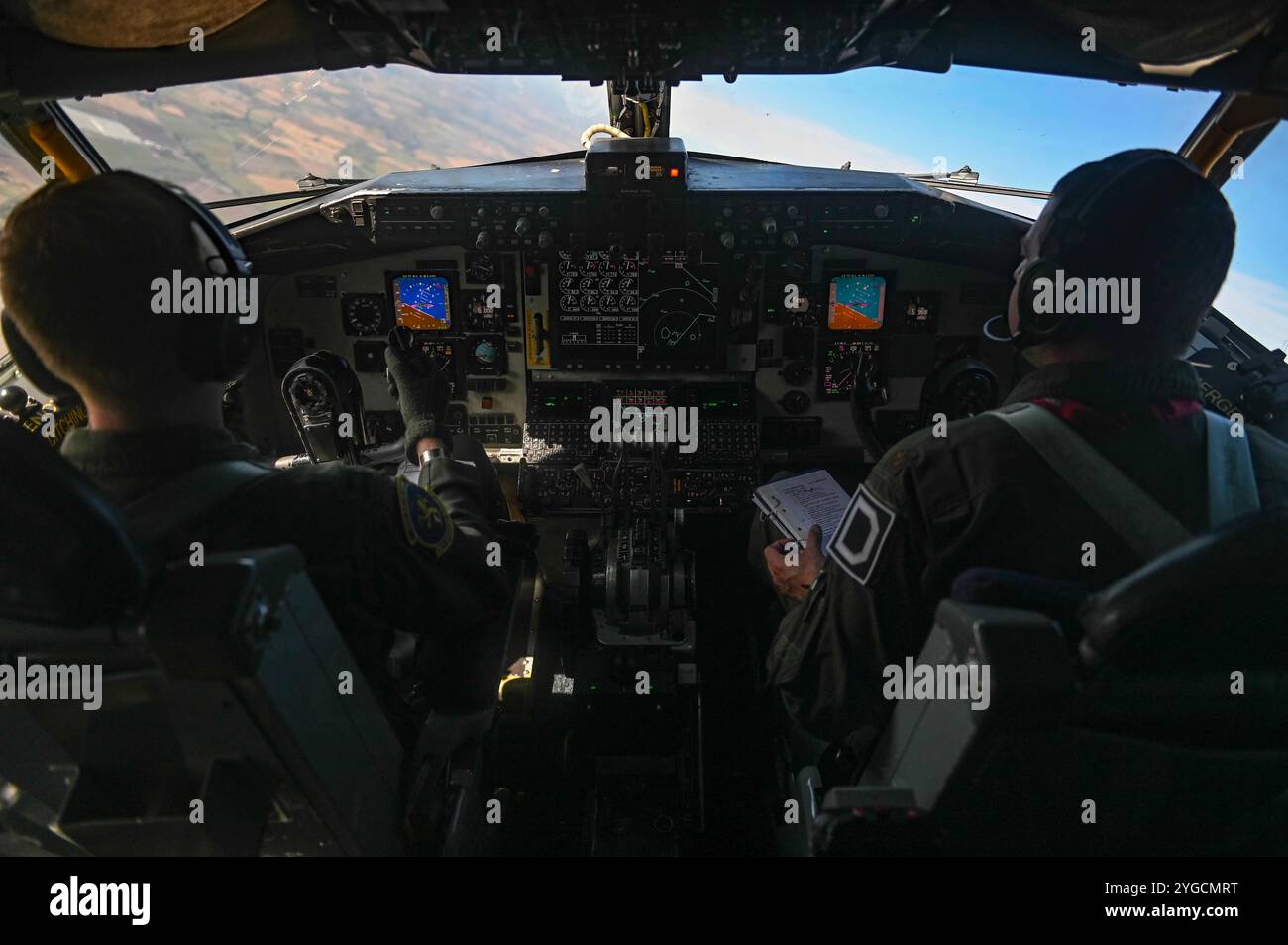 U.S. Air Force Capt. Jarod Suhr, left, and Maj. Brandon Aist, 351st Air ...
