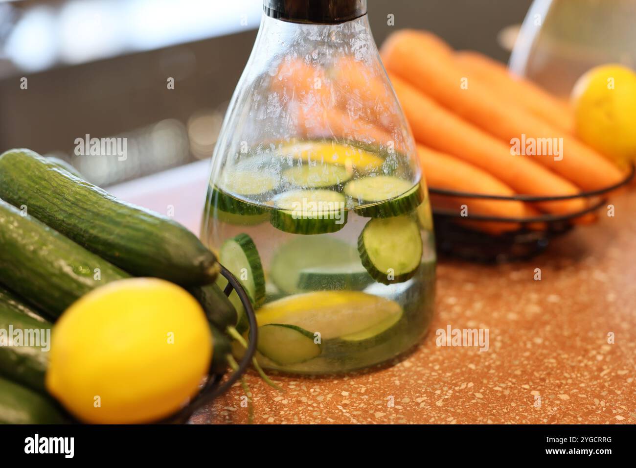 Enjoy a refreshing infused water with crisp cucumbers and citrus fruits ...