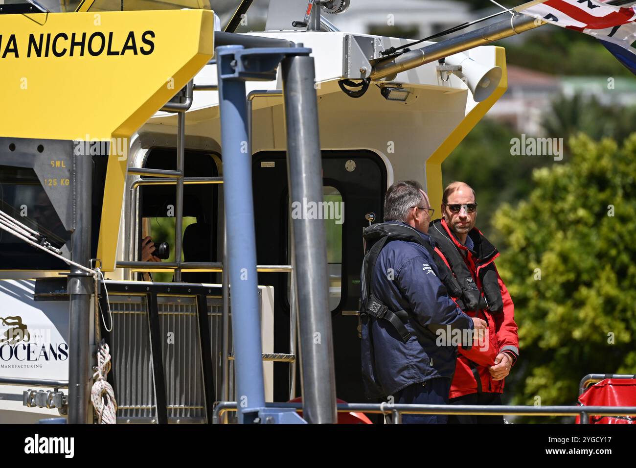 The Prince of Wales (right) talks with a volunteer of the National Seas ...