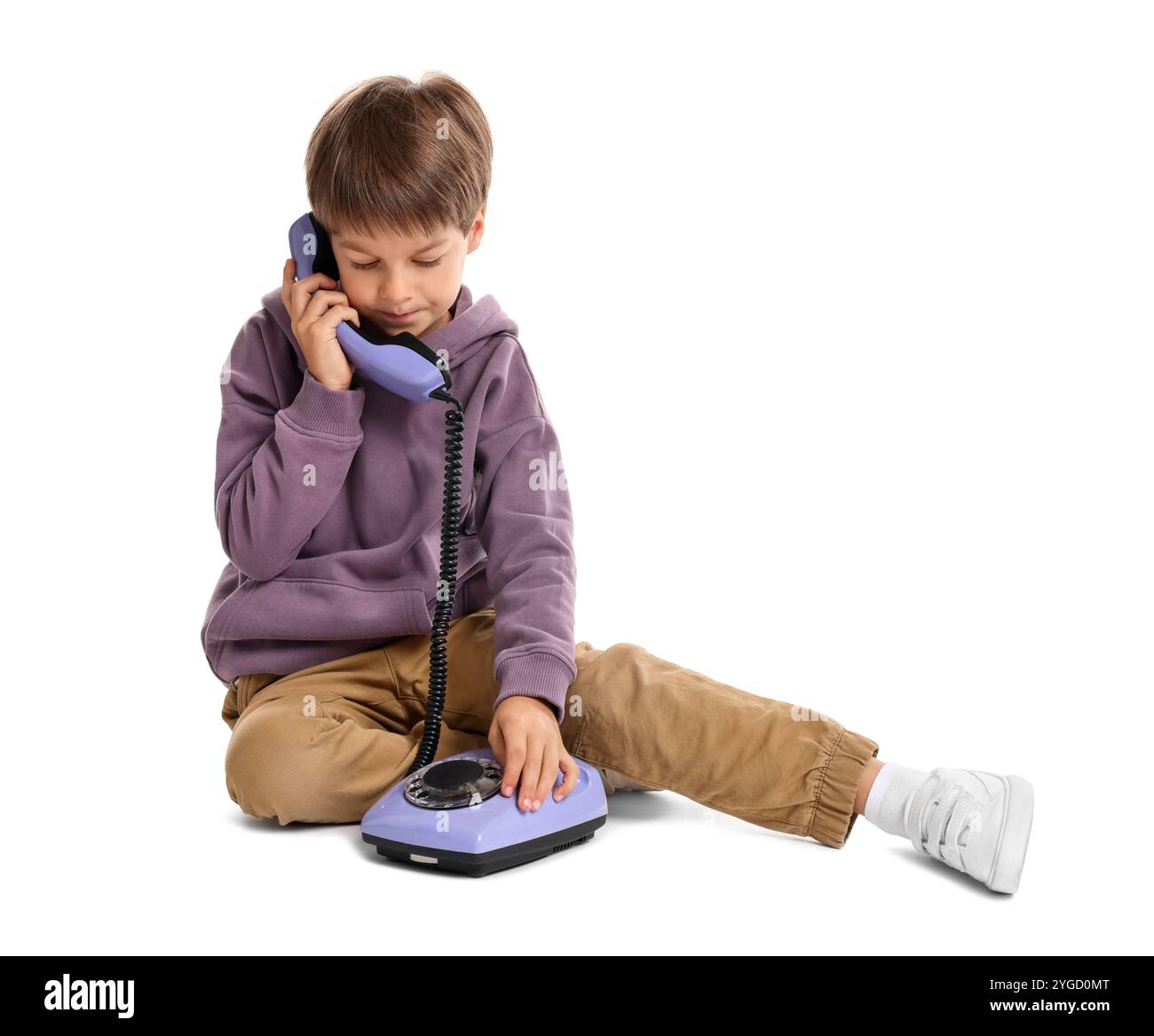 Cute little boy with old telephone on white background Stock Photo - Alamy