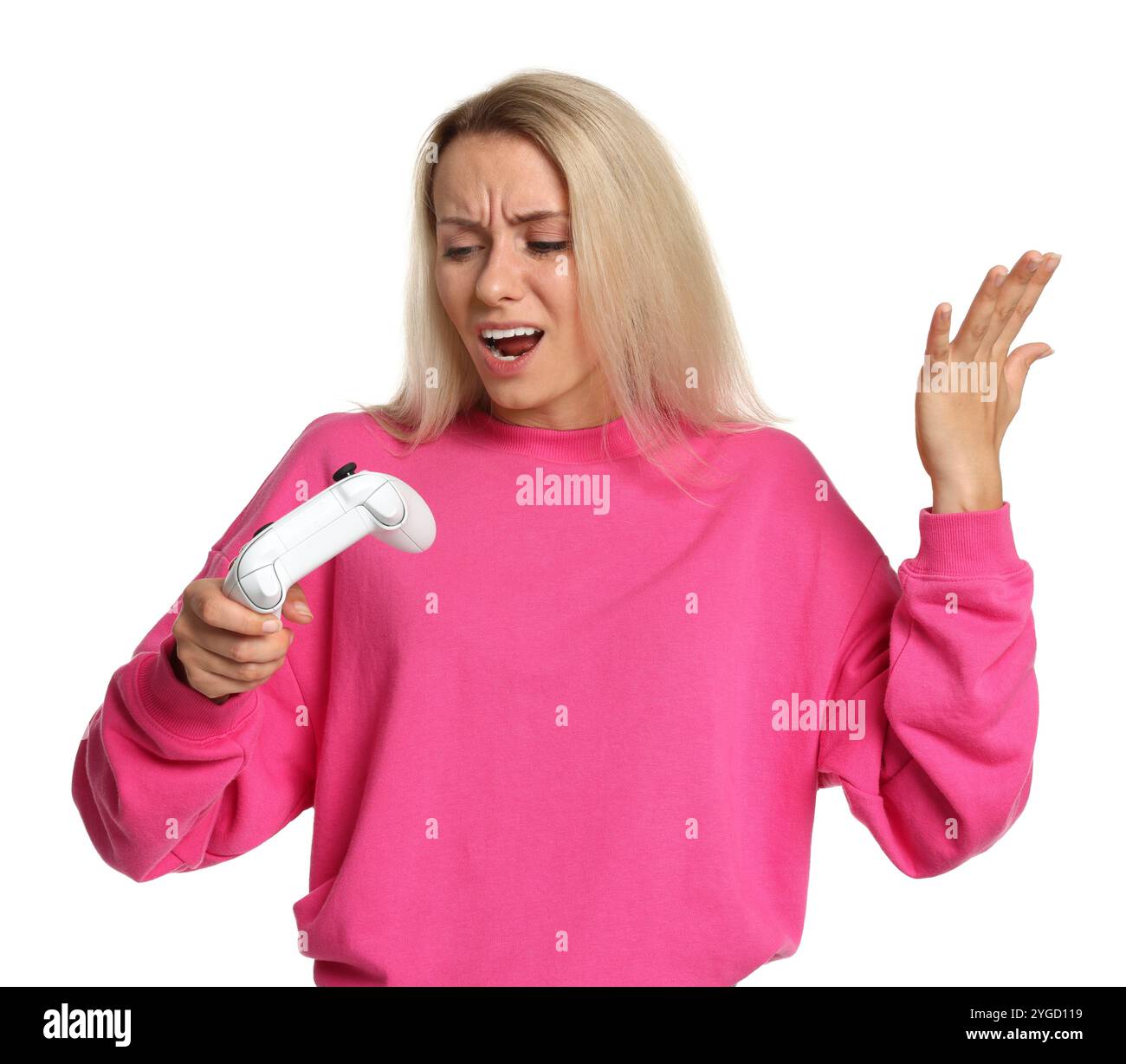 Emotional woman with controller on white background Stock Photo - Alamy