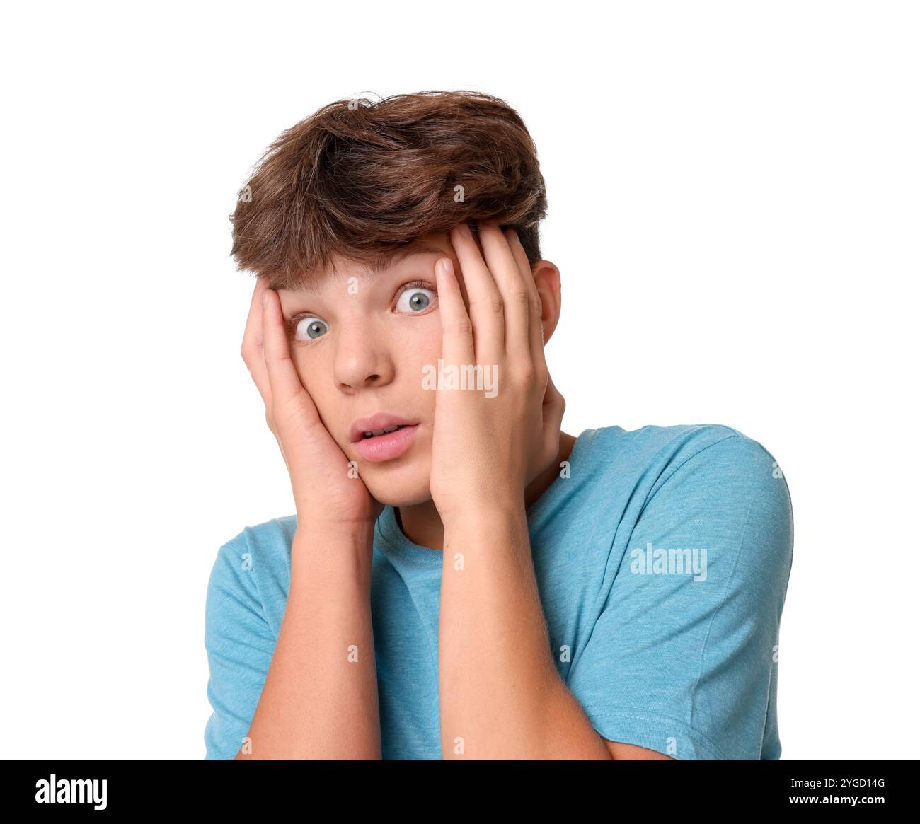 Portrait of scared teenage boy on white background Stock Photo - Alamy