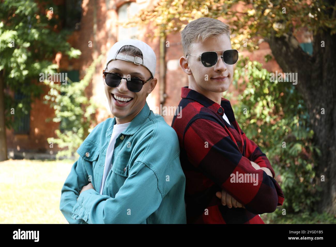 Siblings with arms crossed hi-res stock photography and images - Alamy
