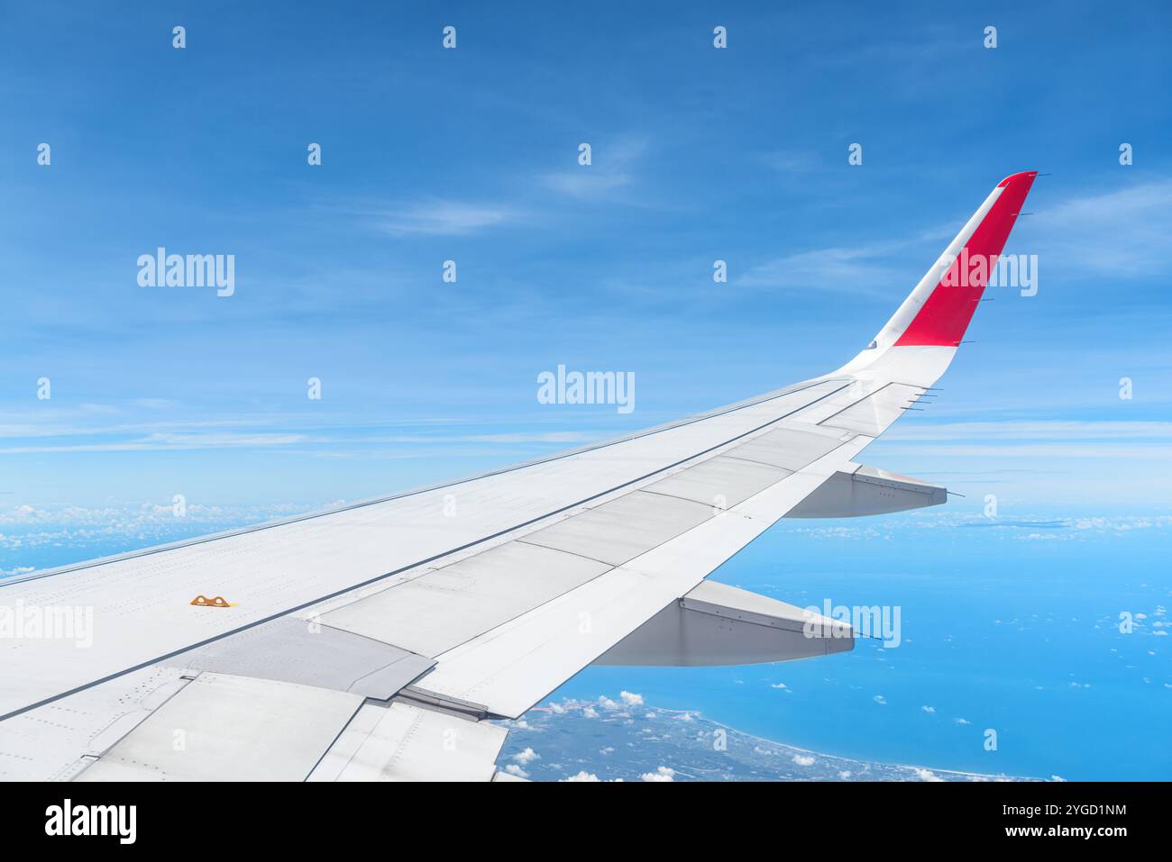 Awesome view of the Earth under the airplane wing Stock Photo - Alamy