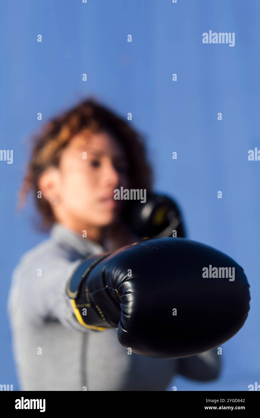 female boxer ready to workout with boxing gloves Stock Photo - Alamy