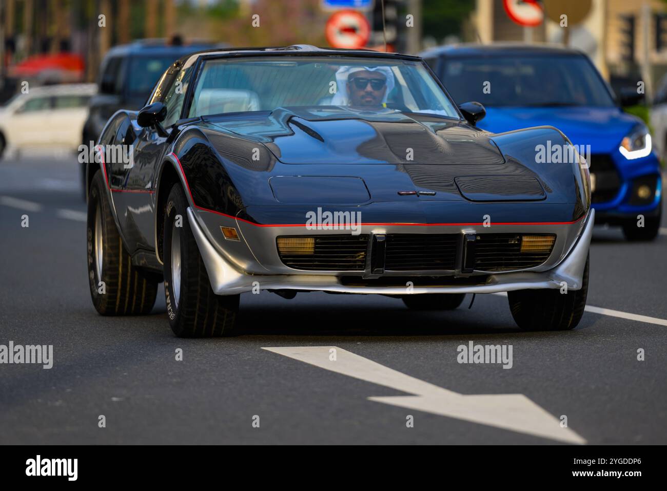 Doha Qatar: April 7, 2024 Two luxury cars participating in the modern ...