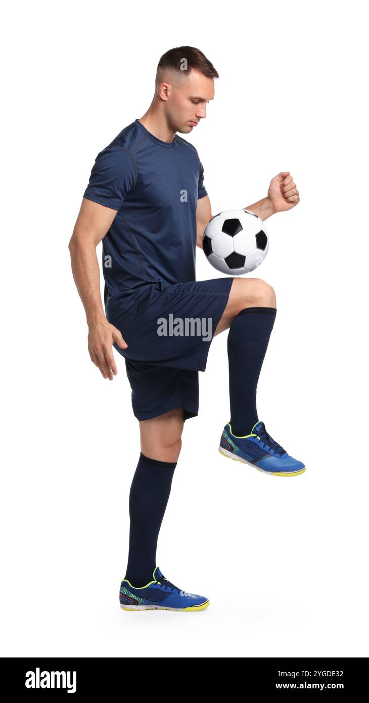 Man playing football with soccer ball on white background Stock Photo ...