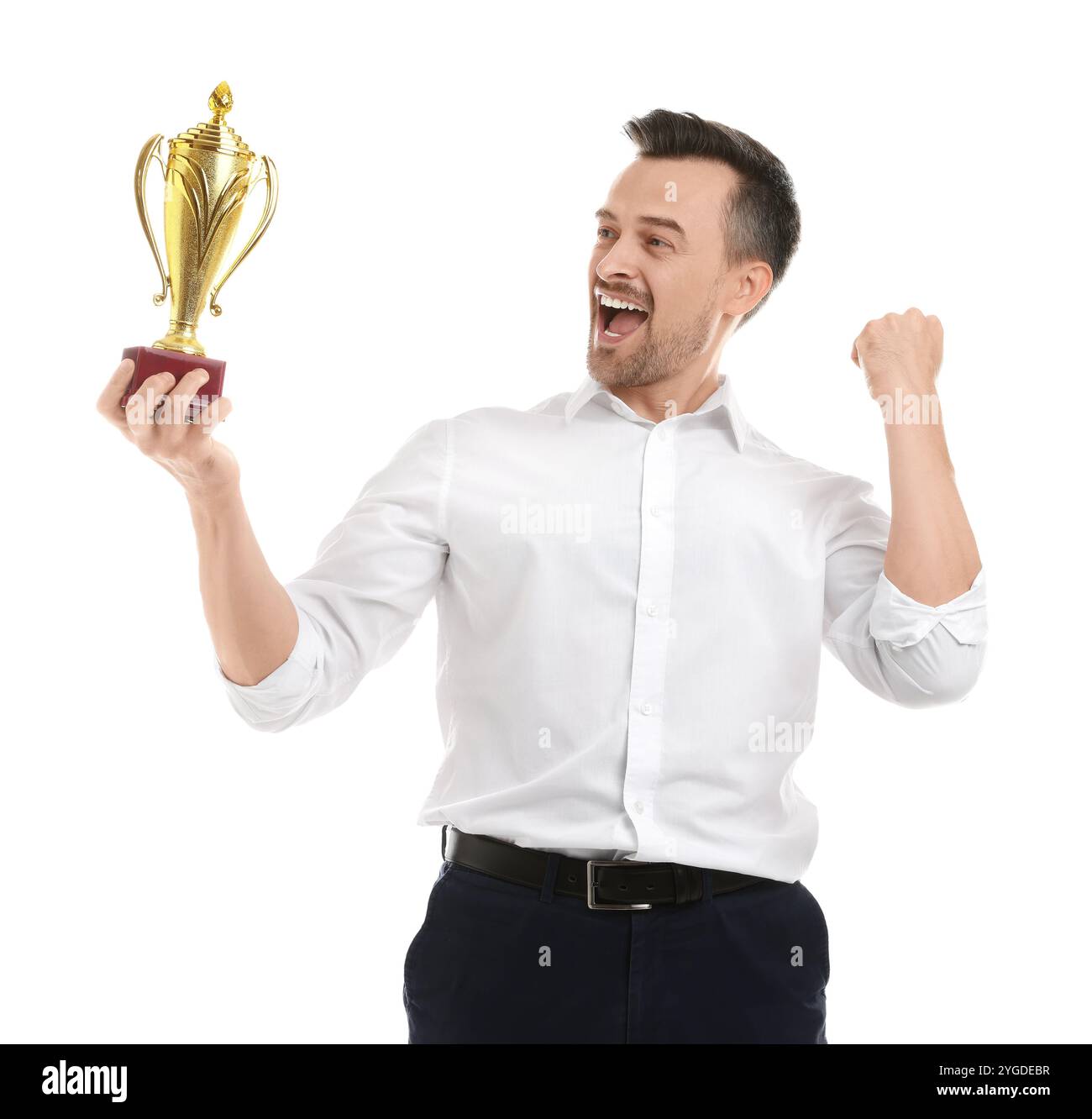 Happy winner with golden trophy cup on white background Stock Photo - Alamy