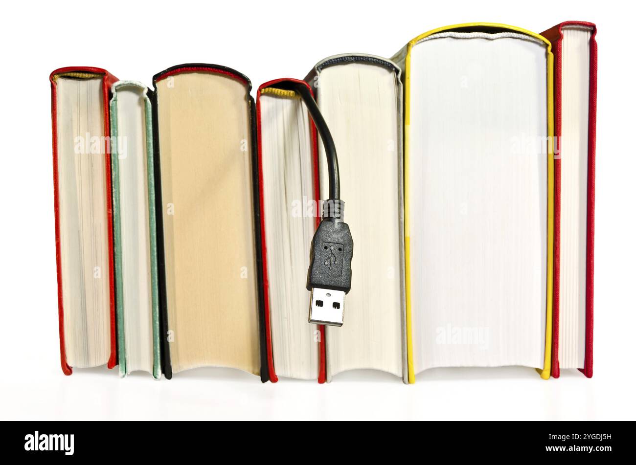 Books with USB cable sticking out Stock Photo - Alamy
