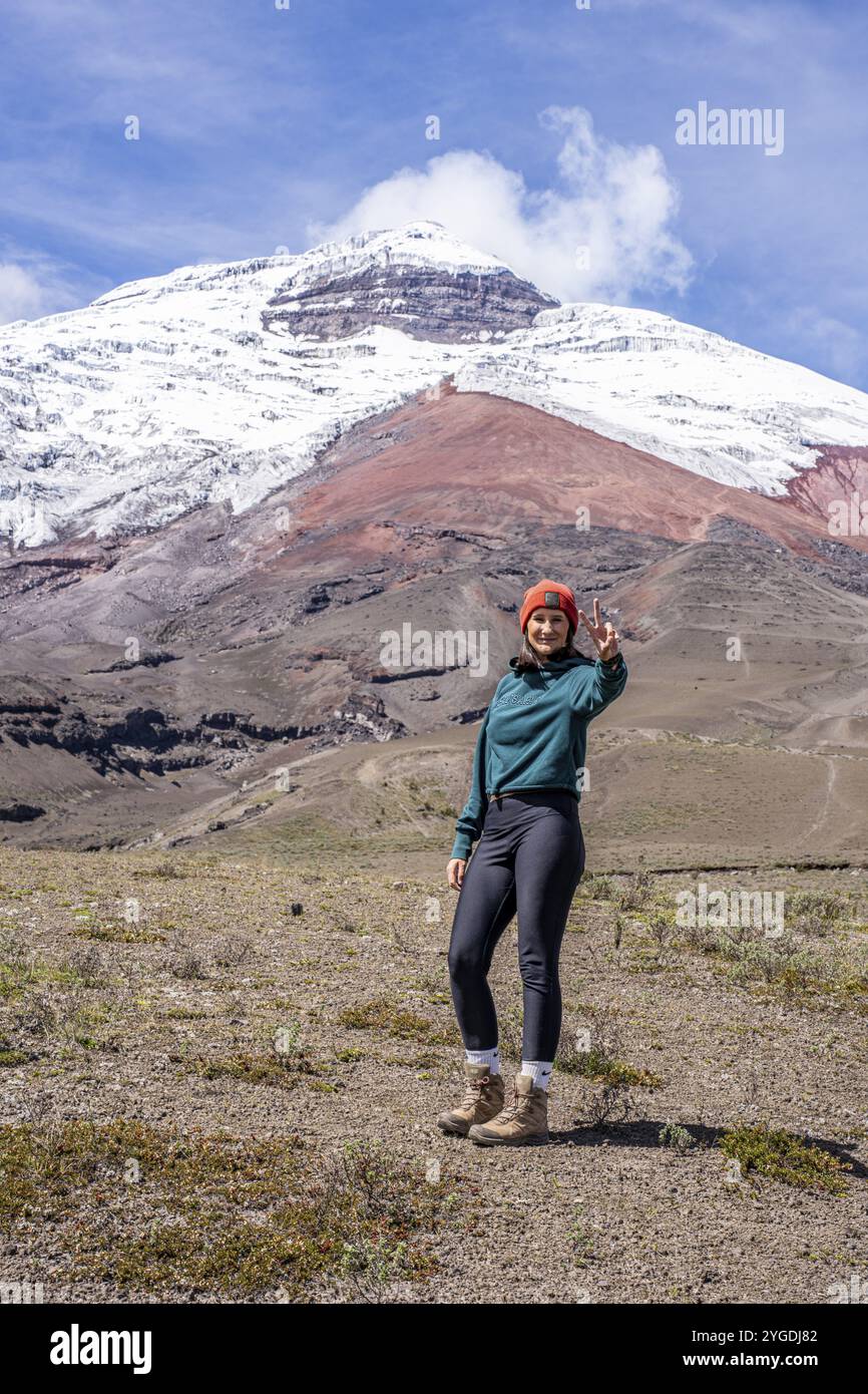 Women poses in front of the Cotopaxi volcano, Cotopaxi, Cotopaxi ...