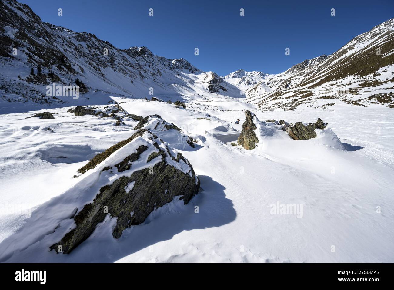 Snow-covered mountain landscape in winter in the Madritsch Valley ...